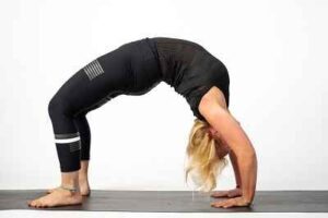 How to Do Upward-Facing Bow Pose in Yoga | Urdhva Dhanurasana | YogaCanada